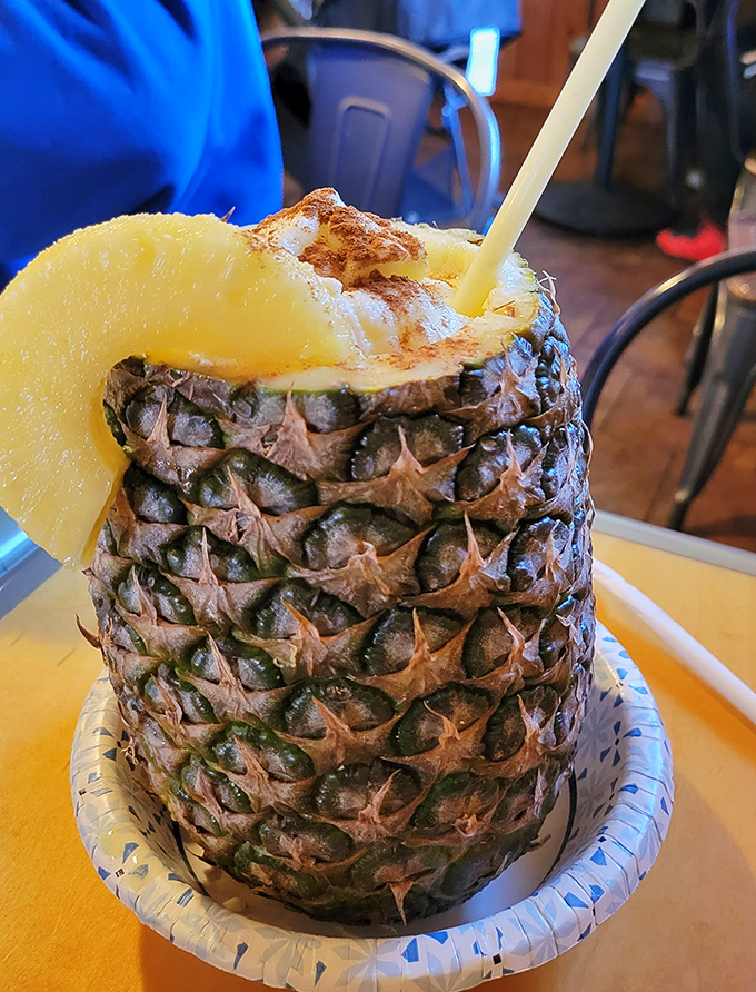 Not just a drink&mdash;a vacation in a pineapple, complete with cinnamon sprinkles and a straw that leads to tropical bliss.