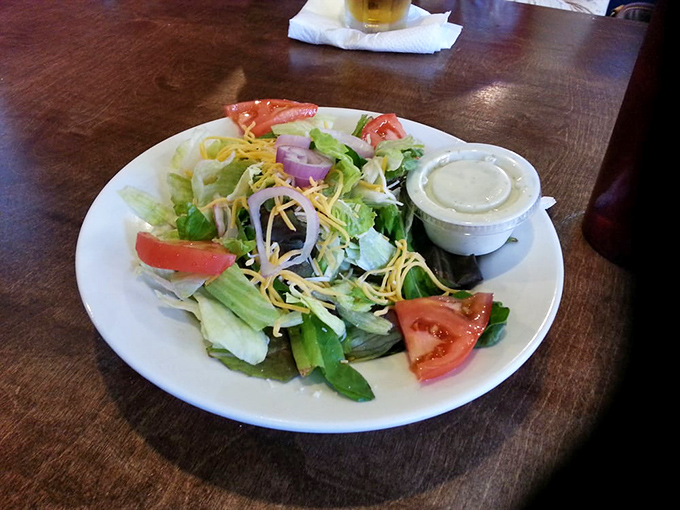 Even the salads at Coosh's show Southern hospitality &ndash; fresh, colorful, and generous enough to make you momentarily forget about those shrimp and grits.