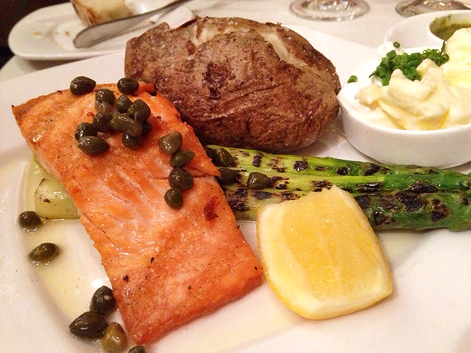 Salmon that clearly took the scenic route from the ocean, picking up capers and flavor companions along the way. The asparagus is showing off too.