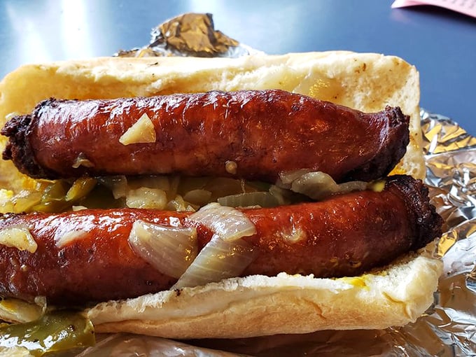 Glistening sausages with caramelized onions on a pillowy roll&mdash;the kind of sandwich that makes you temporarily forget your name.