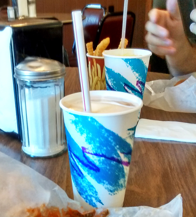 Those blue-swirled shakes aren't just beverages; they're creamy time machines to when a malt shop treat was the highlight of your week.