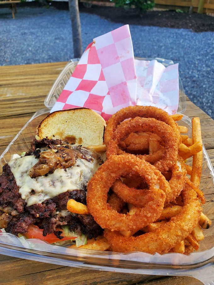 The burger-onion ring alliance creates peace in your mouth while starting a war with your diet plans. Some battles are worth losing.