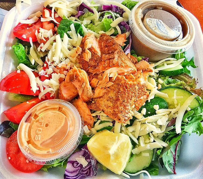 When barbecue joints respect their salads this much, you know they're serious about everything. Smoked protein meets garden-fresh crunch.
