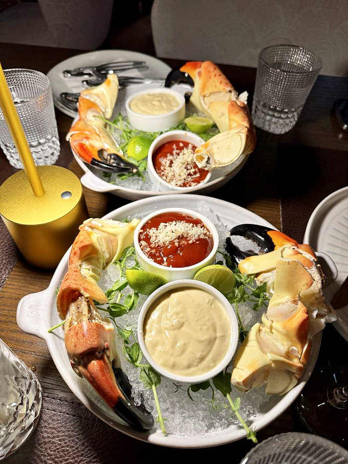 Stone crabs presented with the reverence they deserve. The dipping sauces aren't accessories—they're supporting actors in a delicious drama.