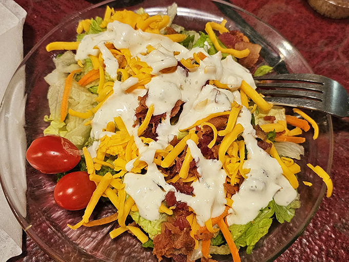 This loaded salad performs the culinary magic trick of making you feel virtuous while simultaneously delivering enough cheese and bacon to qualify as comfort food.