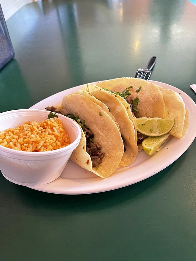Simple street tacos that prove the culinary theorem: the fewer the ingredients, the more important their quality. That lime wedge isn't just garnish&mdash;it's essential.