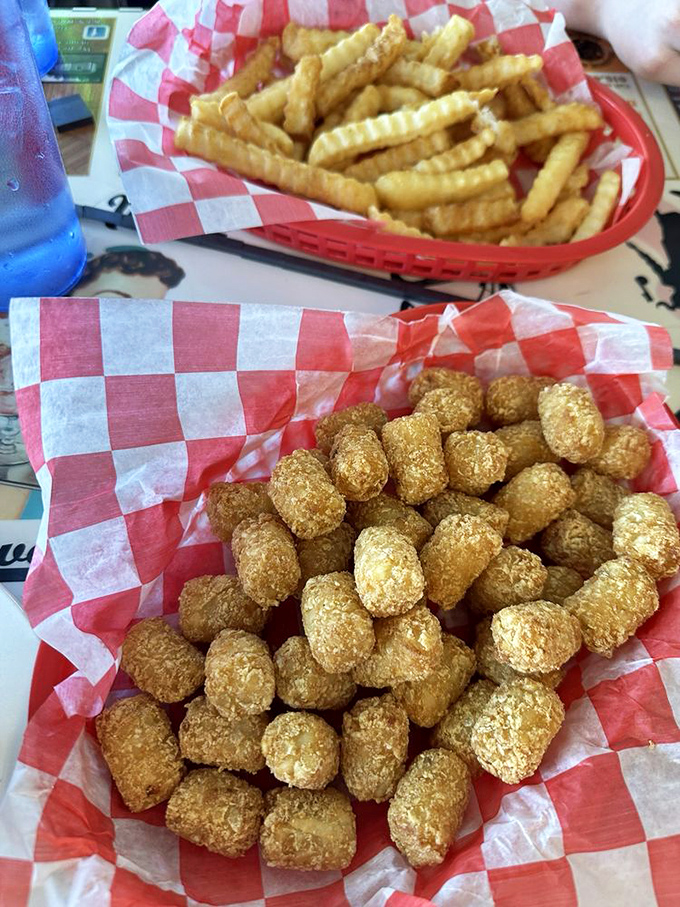 Golden tater tots and crinkle fries&mdash;the dynamic duo of side dishes that have been making vegetables jealous since the 1950s.