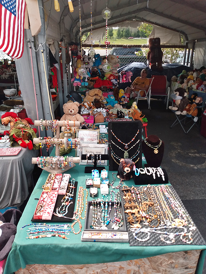 Childhood nostalgia by the pound. Stuffed animals and handcrafted jewelry create an irresistible display of whimsy and craftsmanship. 