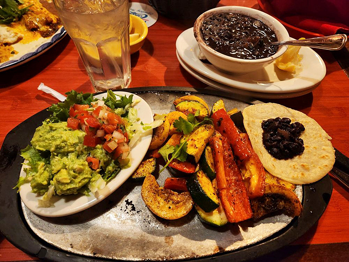 A fiesta of grilled vegetables, fresh guacamole, and black beans that proves plant-based eating doesn't mean missing the party.