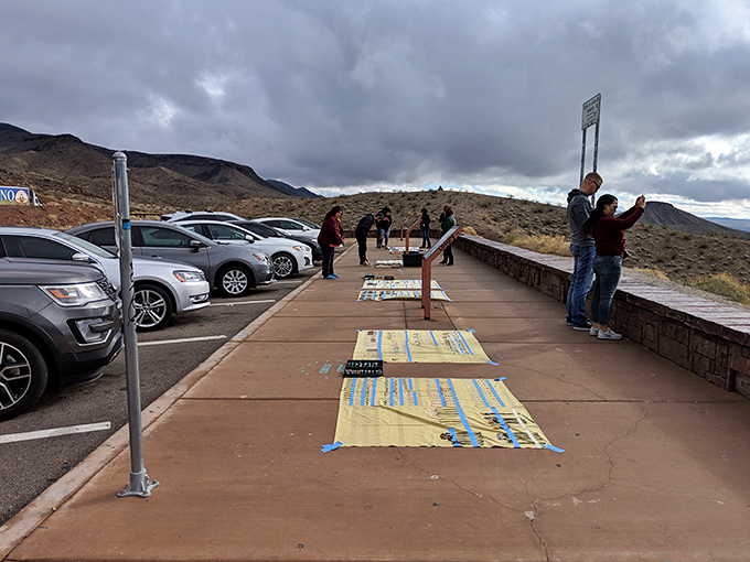 Strangers becoming momentary friends, united by collective awe and the shared experience of feeling wonderfully insignificant.