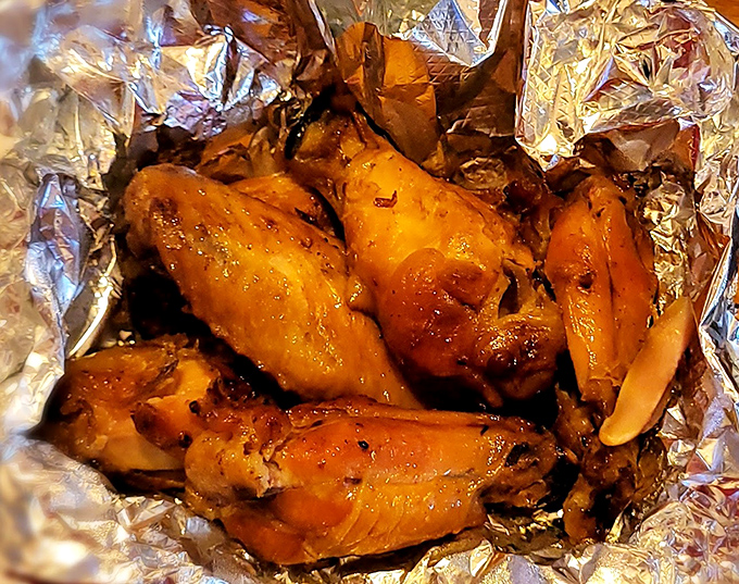 Wings that glow with the amber hue of proper smoking&mdash;these aren't bar food afterthoughts but carefully crafted protein delivery vehicles for sauce.
