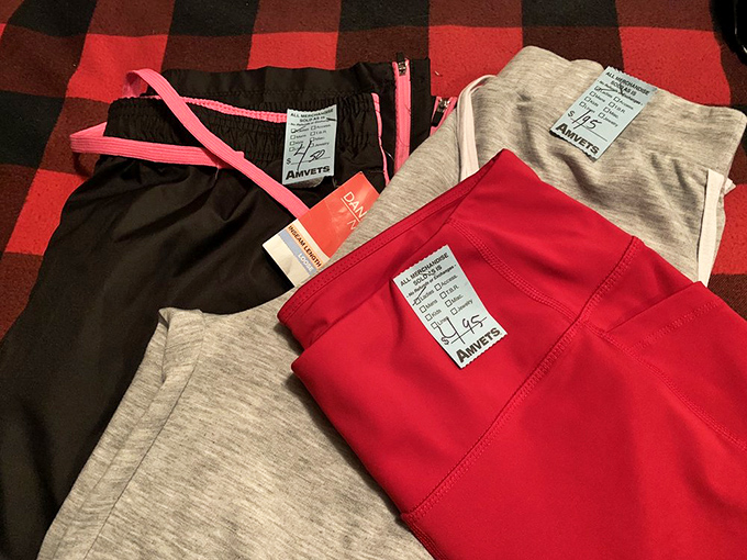 Workout clothes with tags still attached&mdash;the physical embodiment of someone else's abandoned New Year's resolution, now your fitness bargain.