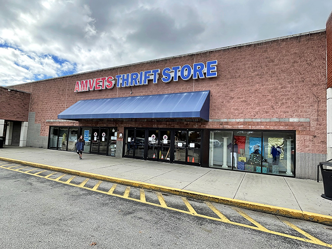 Thrift shopping with a mission! AMVETS' bold signage reminds shoppers that bargain hunting here supports American veterans.