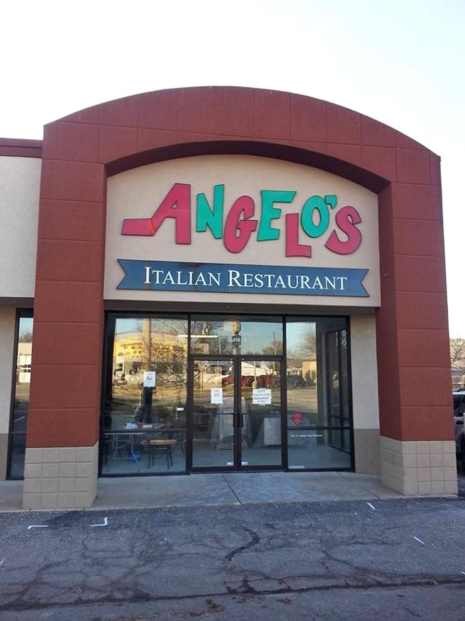 Angelo's colorful entrance is like pizza wearing its Sunday best. A little fancy on the outside, wonderfully familiar on the inside.