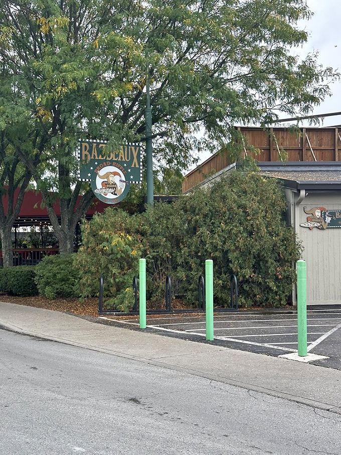 Bazbeaux's charming sign peeks through the greenery like a pizza speakeasy&mdash;only the worthy know to look for this Indianapolis treasure.