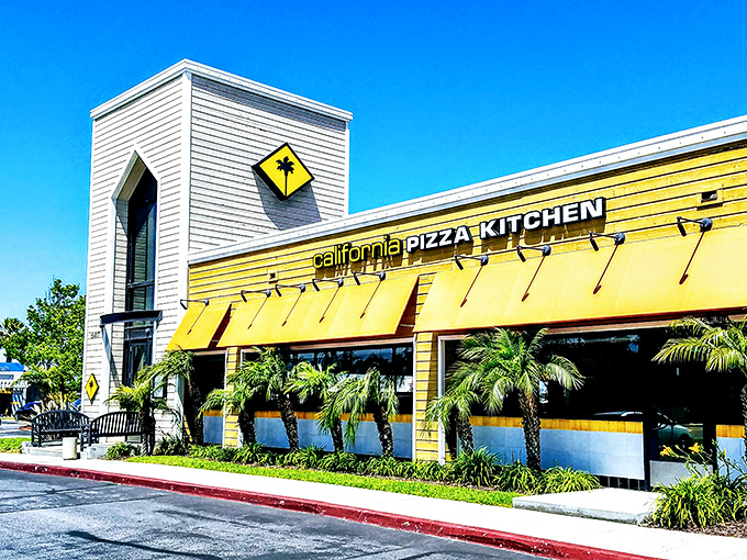 California Pizza Kitchen's sunny yellow exterior matches the Golden State freshness inside. Chain restaurant? More like charm restaurant!