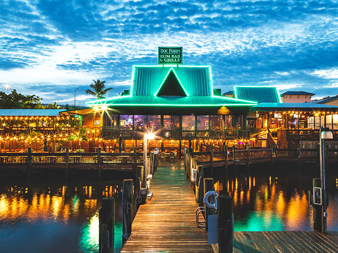 Glowing green against the twilight sky, Doc Ford's beckons like a tropical lighthouse for hungry sailors and landlubbers alike.