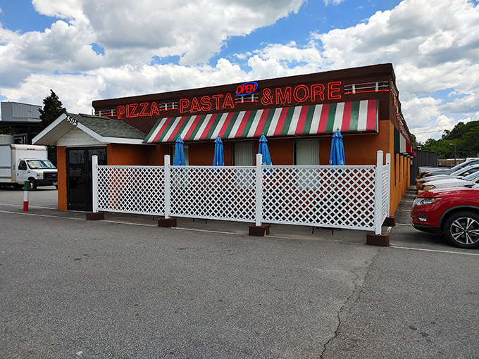 Elizabeth's red and white striped awning is the pizza equivalent of a lighthouse, guiding hungry sailors to cheesy shores.