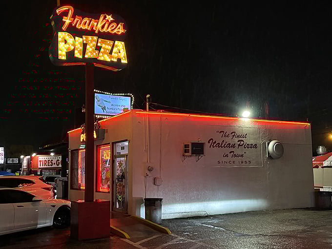 Frankie's vintage sign glows like a pizza lighthouse in the night. This Miami institution has been perfecting square slices since before South Beach was cool.