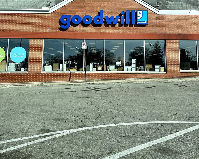 Goodwill's familiar blue sign signals a thrifting adventure where one person's donations become another's delightful discoveries.