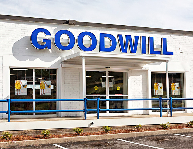 The iconic blue Goodwill sign—a universal symbol for treasure hunters everywhere. Atlanta's Northside Drive location is particularly bountiful.