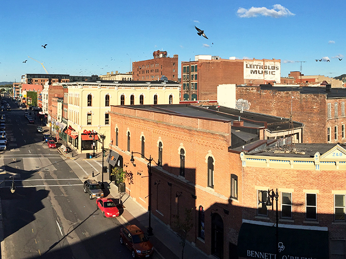 La Crosse's riverside walk &ndash; where bronze pioneers forever tip their hats to passing joggers and Mississippi River barges.