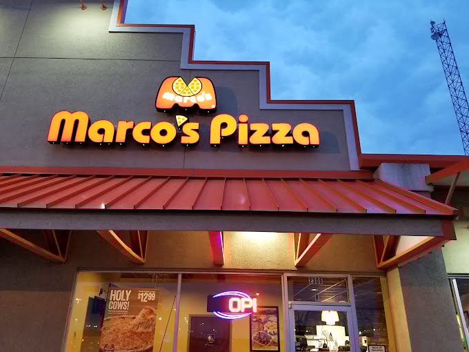 Marco's bright orange roof stands out like a pizza-loving flamingo. Sometimes chain restaurants surprise you with neighborhood heart.