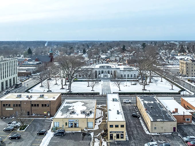 A town where the courthouse clock tower keeps watch over brick-lined streets that haven't surrendered their character to chain stores.