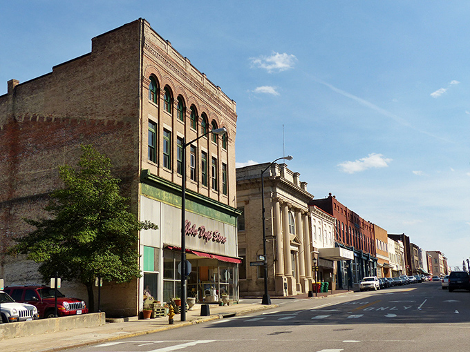 Historic buildings stand proud along these sidewalks, each one a testament to resilience and the American spirit of renewal. 