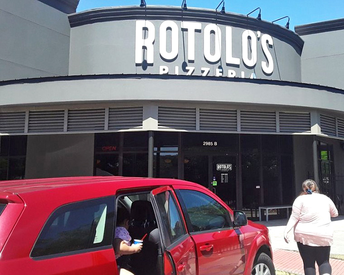 Modern on the outside, traditional where it counts. This curved building houses straight-up delicious pizza.