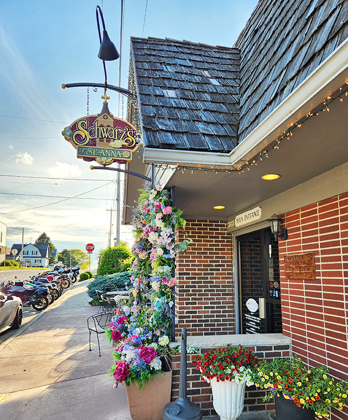 Schwarz's flower-adorned entrance softens you up before they knock you out with steak perfection. Clever strategy!