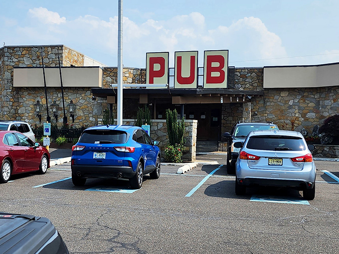 The Pub's stone facade and bold signage announce: serious steak business happens here. No Instagram filters needed on these meals!