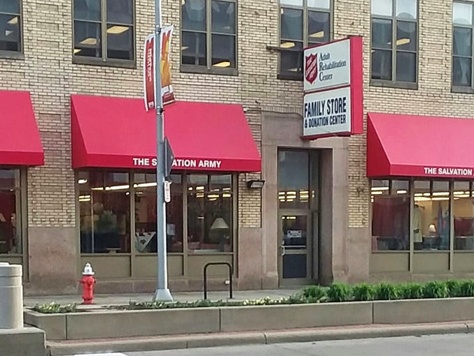 Urban thrifting with character! The classic brick building and cheerful awnings promise vintage treasures in the heart of the city.