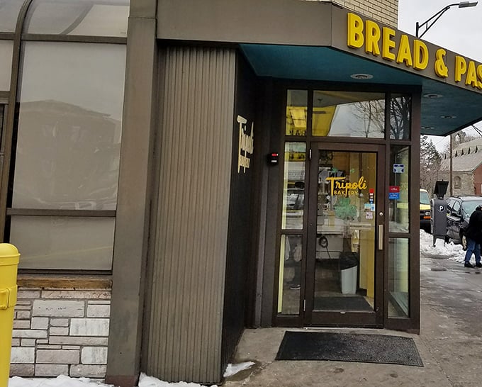 No fancy food court could match Tripoli's straightforward charm &ndash; those bright yellow letters promise pizza worth writing home about.