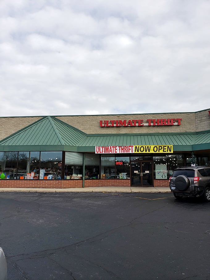 Green roof, red letters, endless possibilities! Ultimate Thrift lives up to its name with a storefront promising adventure.