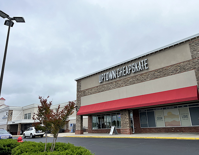 Uptown Cheapskate brings boutique vibes to the thrift world. That stone facade hints at the curated fashion treasures waiting inside.