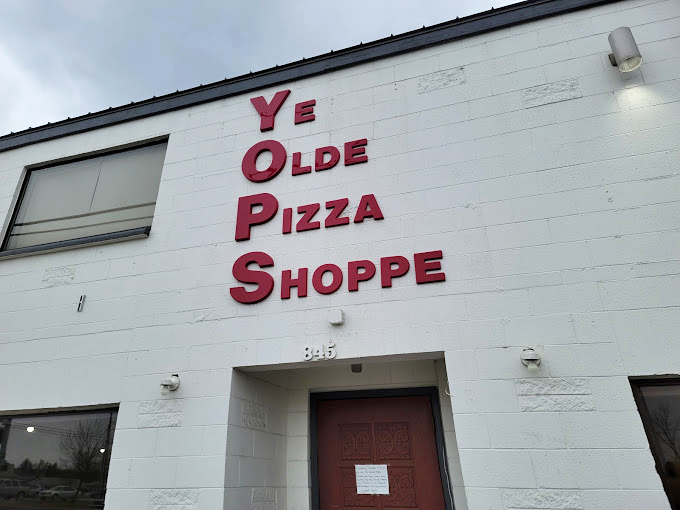 Those bold red letters on white might as well say "Time Machine" &ndash; Ye Olde Pizza Shoppe is deliciously stuck in the past.