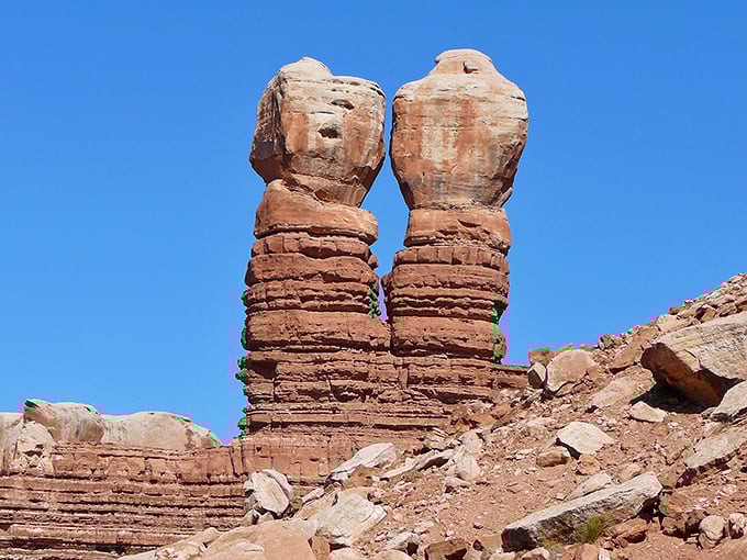 The iconic Twin Rocks formation stands sentinel over Bluff. Nature's own version of a landmark address!