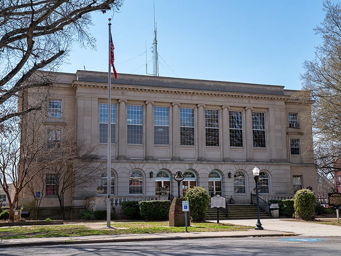 The historic storefronts of Clarksville maintain their small-town dignity. That turquoise awning adds just the right pop of color!