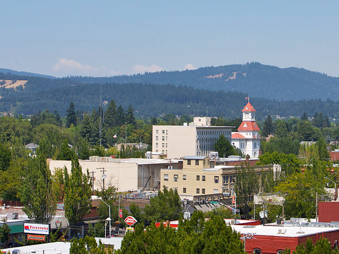 Sun-drenched buildings nestled among evergreens. Corvallis offers natural beauty and urban amenities without the premium price tag of larger Oregon cities.