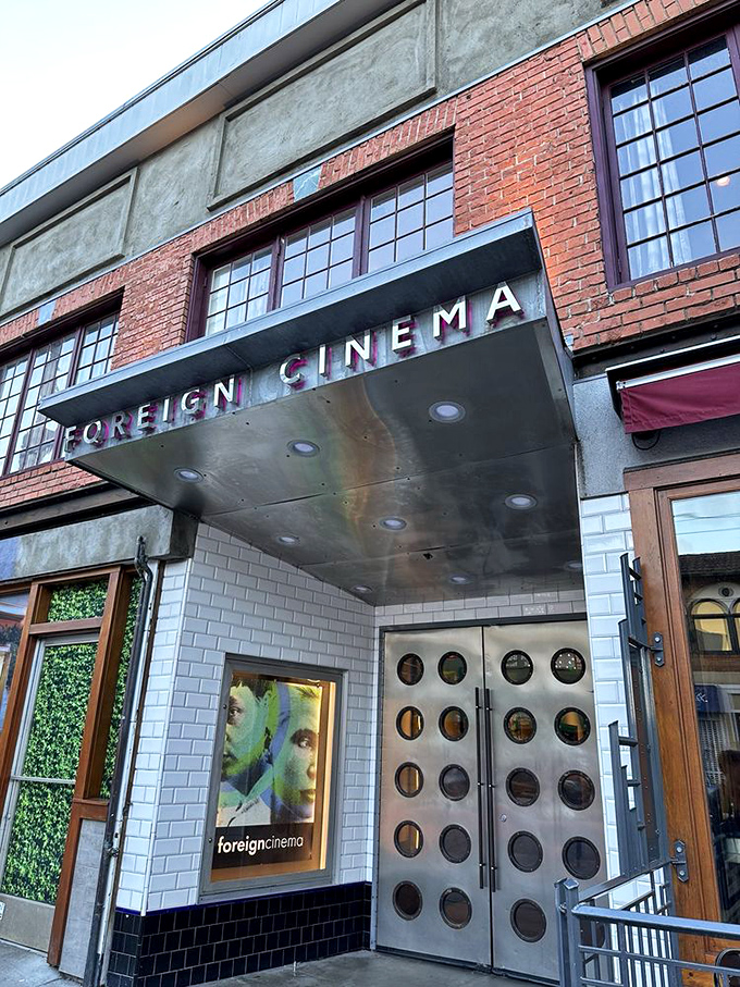 Foreign Cinema: Movies under the stars with a side of California cuisine. This entrance promises both visual and culinary feasts.