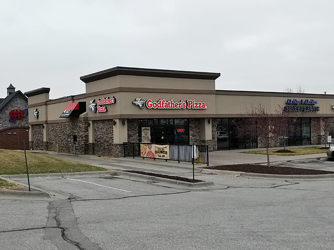 Behind these Godfather's doors lies a pizza experience that's anything but ordinary. Thick crust paradise awaits! 