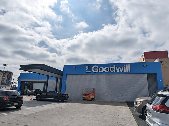 Goodwill's bright blue building stands like a beacon of hope for both budget shoppers and dedicated collectors.