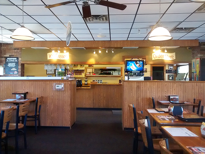 The warm, wood-paneled interior feels like a pizza party waiting to happen&mdash;just add friends and appetite.