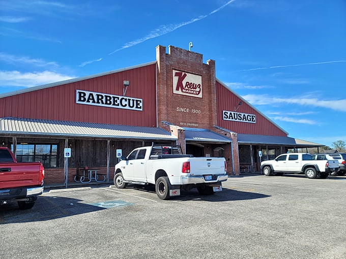 The "Since 1900" sign isn't just marketing &ndash; Kreuz Market has been perfecting post-oak smoked meat for over a century.