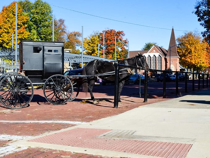 This brick church with its gleaming white steeple stands as a testament to faith, community, and architectural beauty.