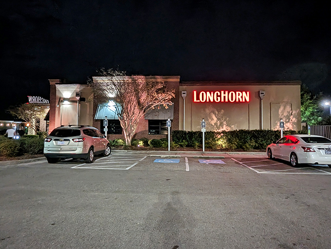 Even at night, LongHorn's welcoming entrance promises sizzling satisfaction. No need to ride the range for great beef!