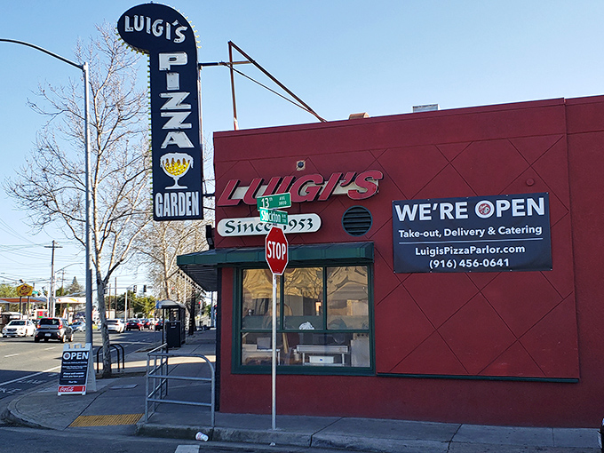 That vintage sign has been pointing the way to pizza happiness since 1953. Some relationships last; the best ones involve cheese.