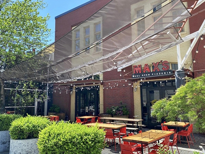 Brick building, wooden tables, and pizza that tastes like Italy called to say "we approve!" Max's patio begs you to linger just one slice longer.