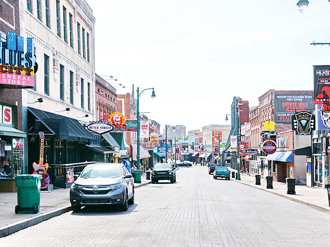 Beale Street's neon signs illuminate a city where certain neighborhoods offer surprising affordability amid urban excitement.